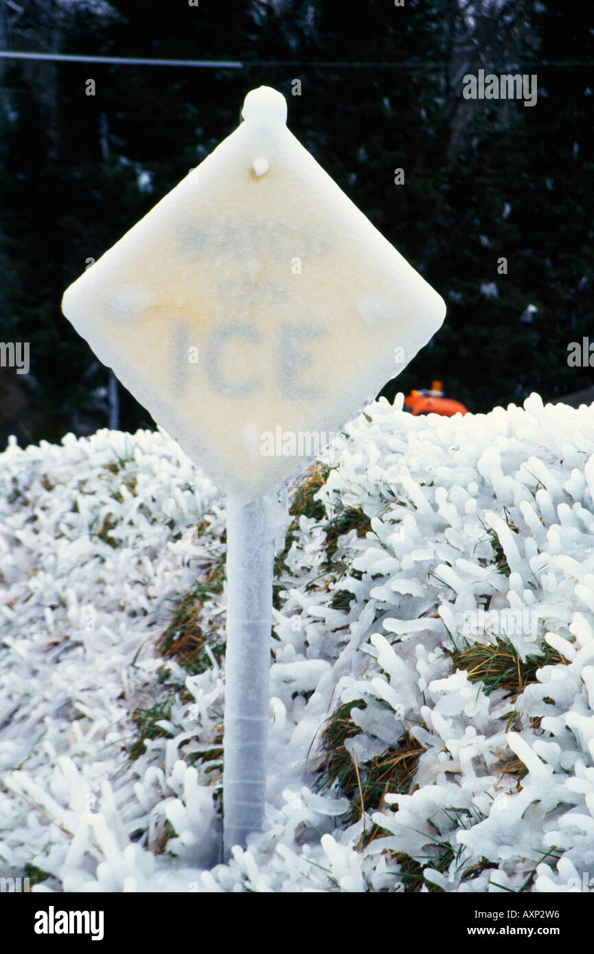 Ice covered traffic sign Stock Photo - Alamy