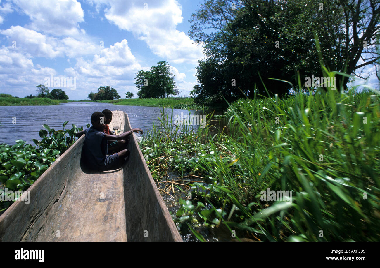 Small boy in traditional dugout canoe Sepik River tributary Papua New ...