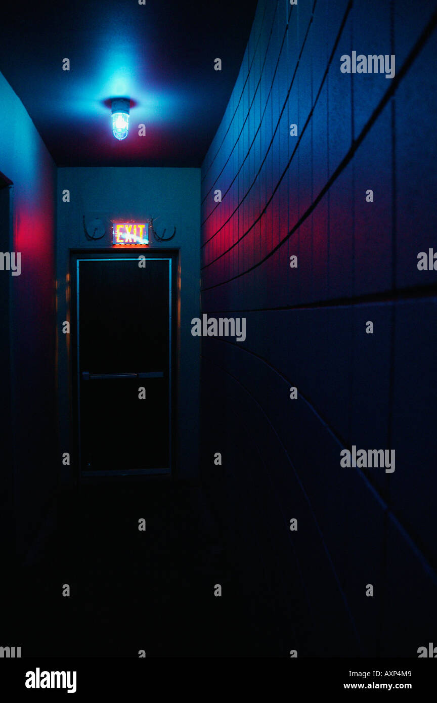 Dark hallway and exit Stock Photo - Alamy
