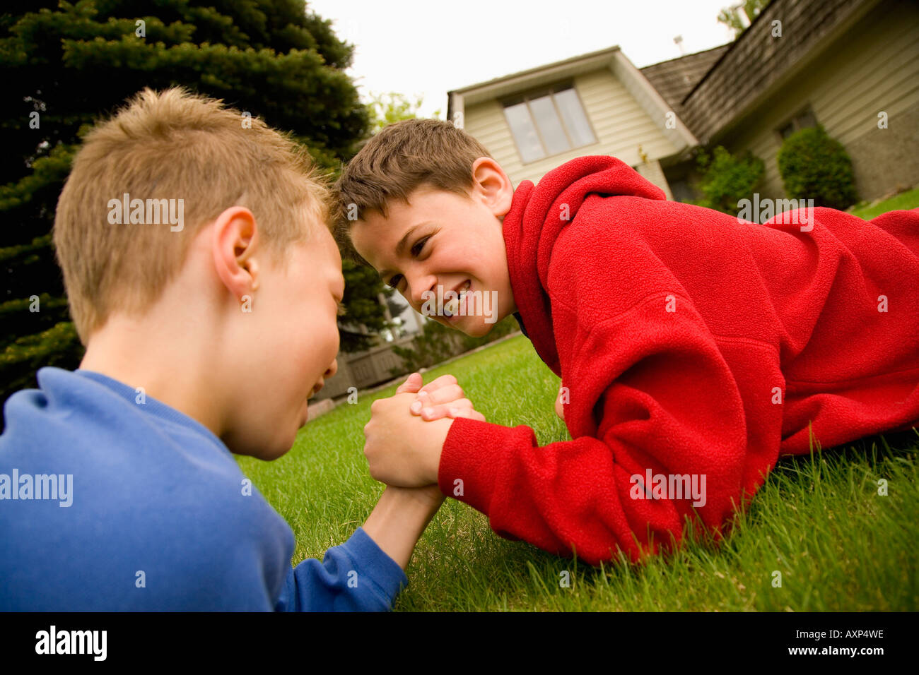 Children arm wrestling Stock Photo - Alamy