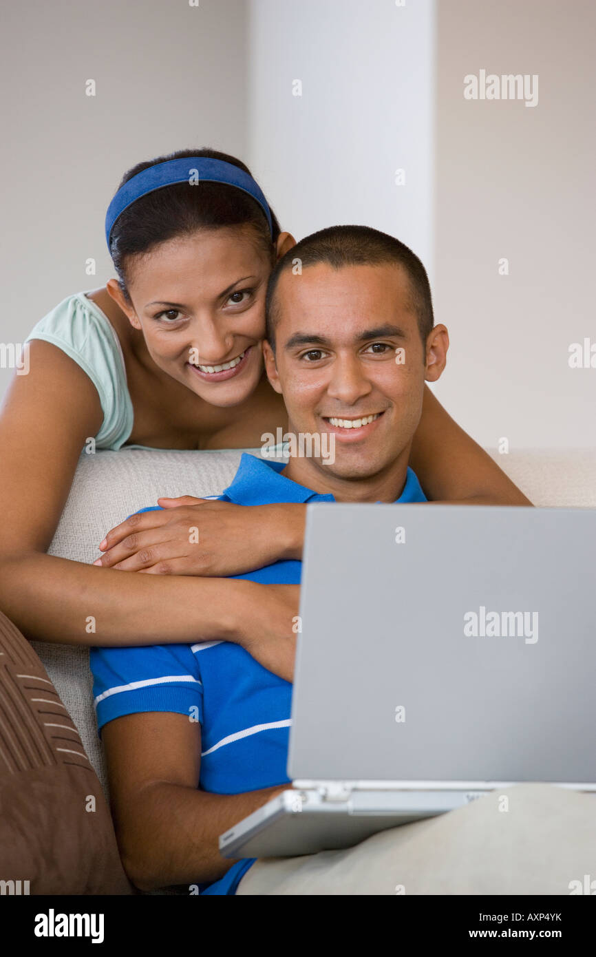 Young couple hugging Stock Photo - Alamy