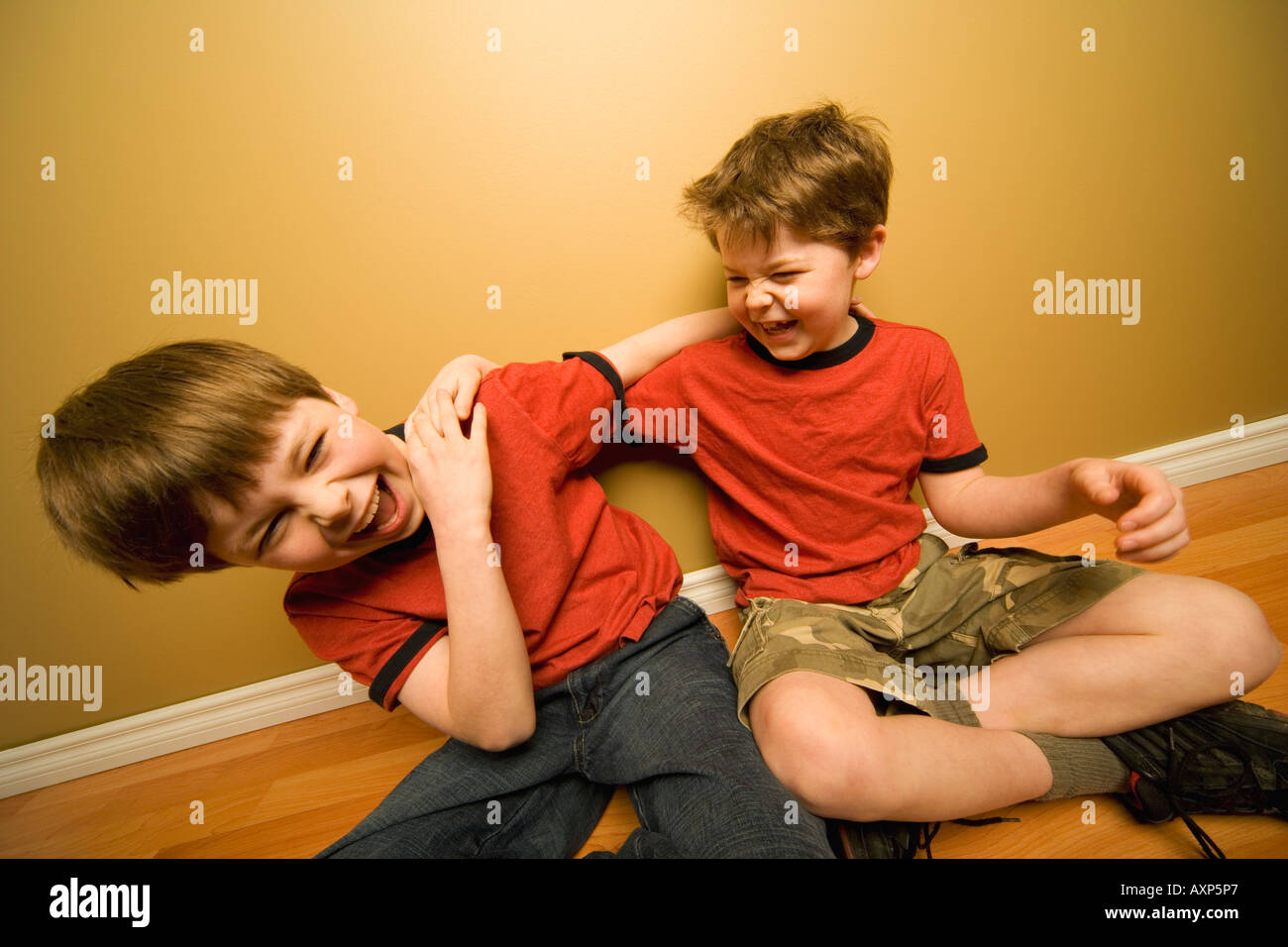 Boys play fight home hi-res stock photography and images - Alamy