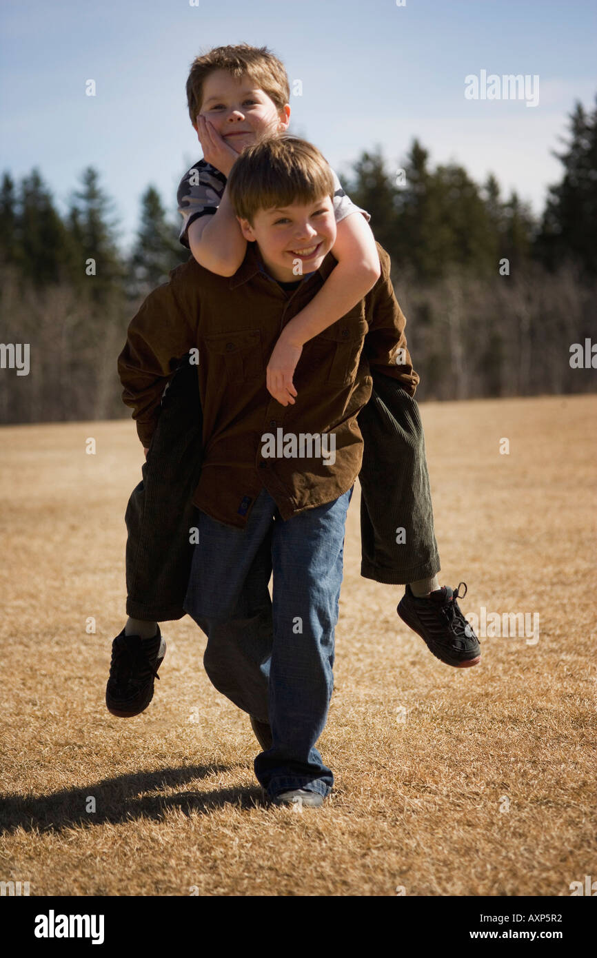 Boys playing together Stock Photo - Alamy