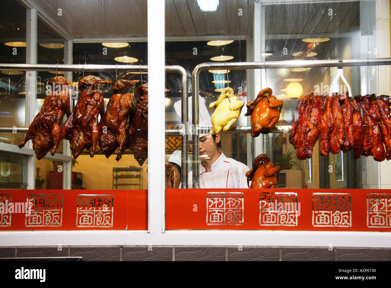 'Peking Duck' on display in a take away restaurant window in China ...