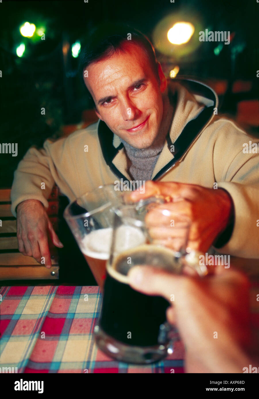 Beer cheers at bar hi-res stock photography and images - Alamy