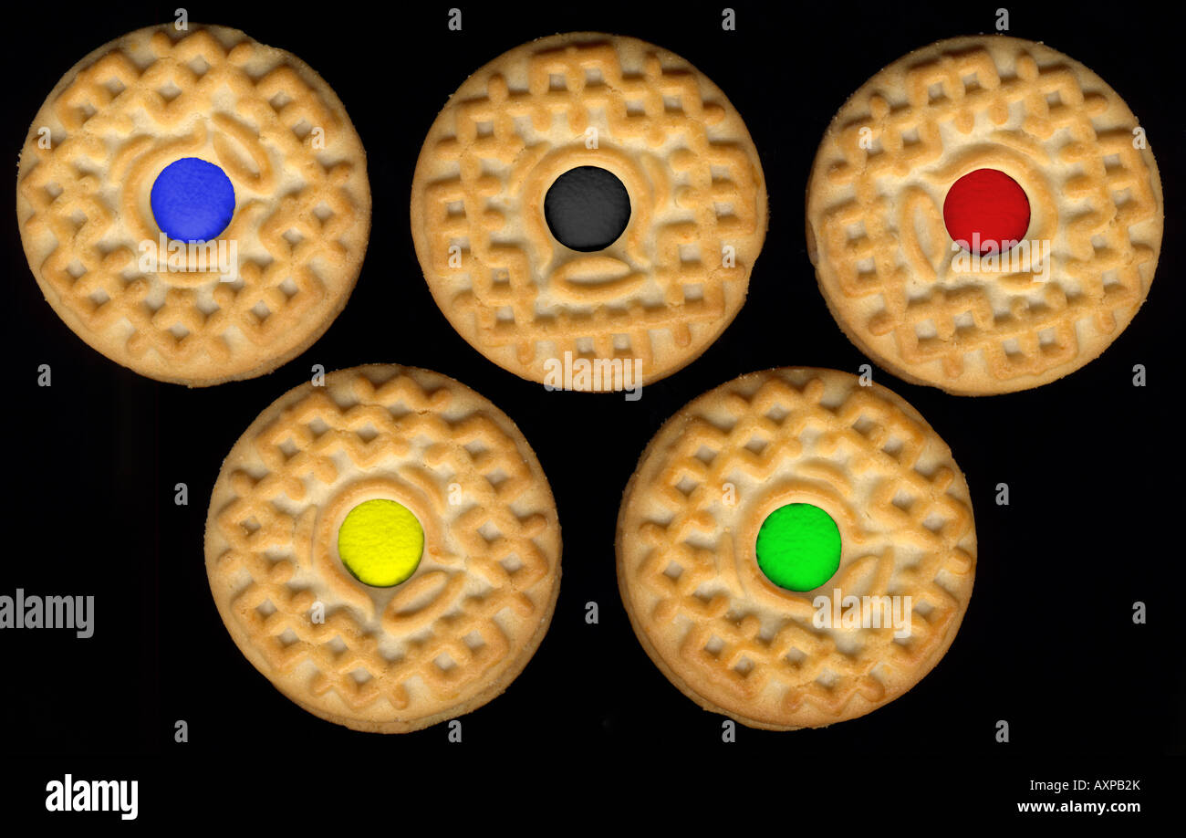 five cream sandwich cookies mimic olympic rings on black background ...