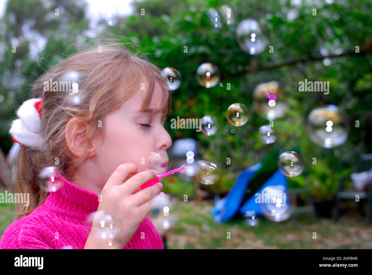 Child blowing soap bubbles Stock Photo - Alamy Child blowing soap bubbles Stock Photo - Alamy