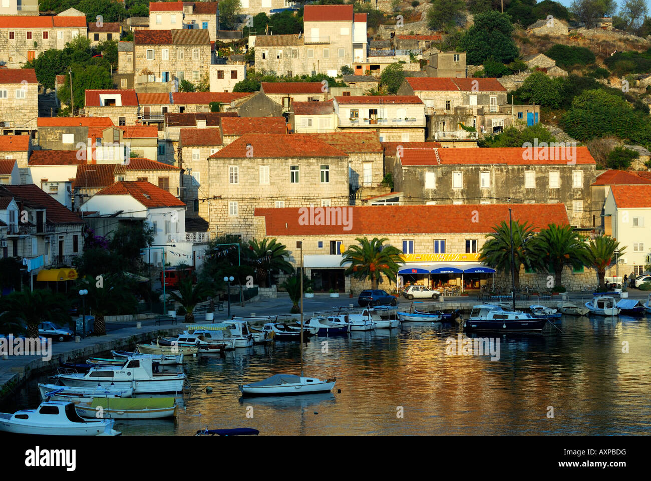 View of harbour in village of Racisce at dawn, island of Korcula ...
