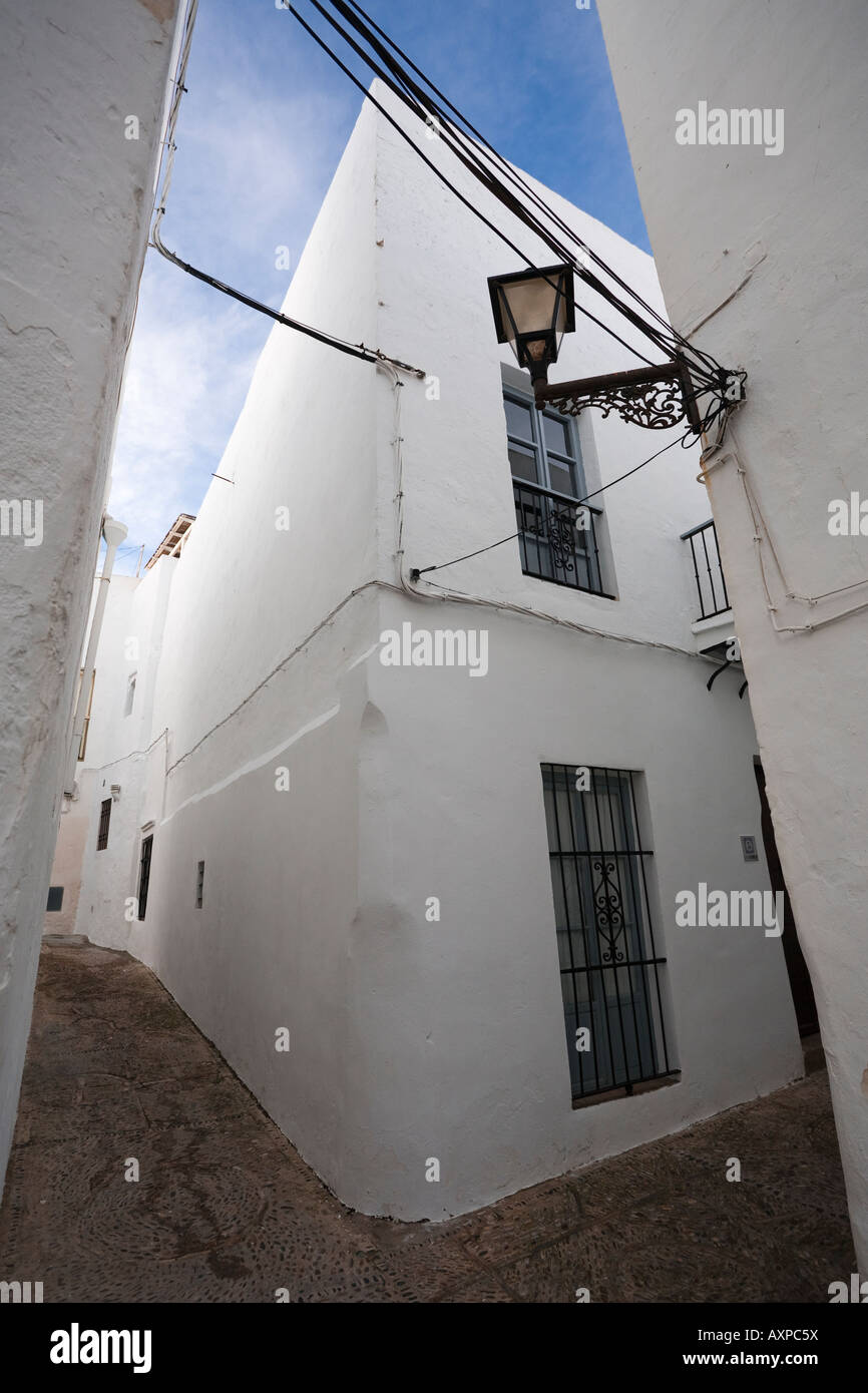 white washed Spanish street corner Stock Photo - Alamy