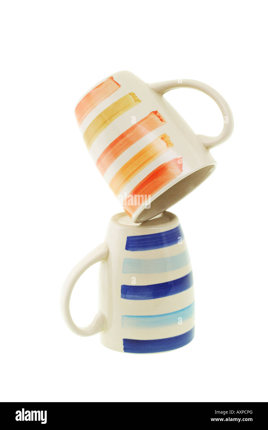 Inverted Coffee mugs on white background Stock Photo - Alamy