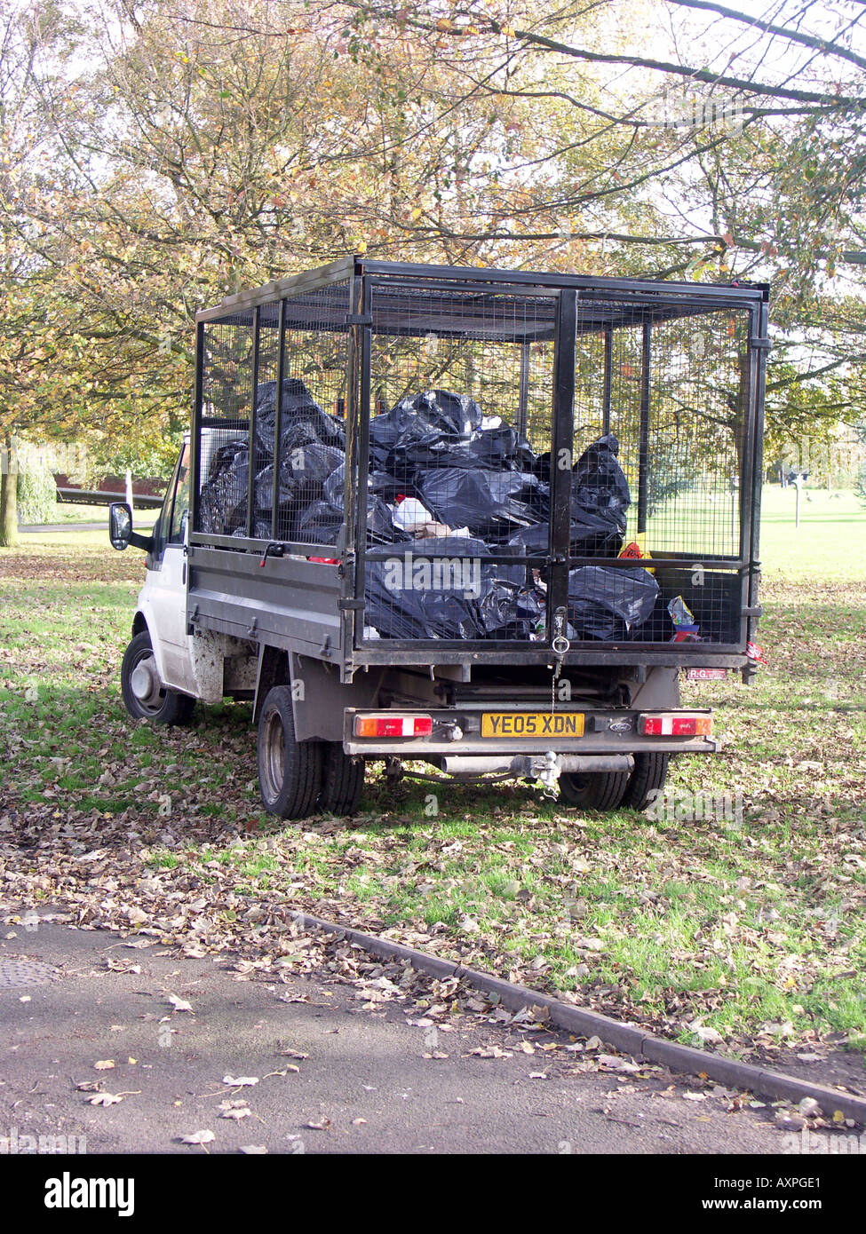 Council truck with bags of rubbish Stock Photo - Alamy
