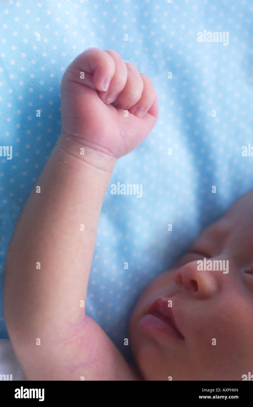 Shot of arm and head of newborn baby Stock Photo - Alamy