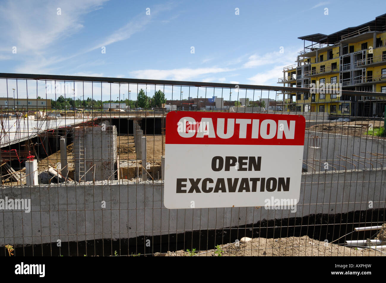 Caution sign at a large construction site Stock Photo - Alamy
