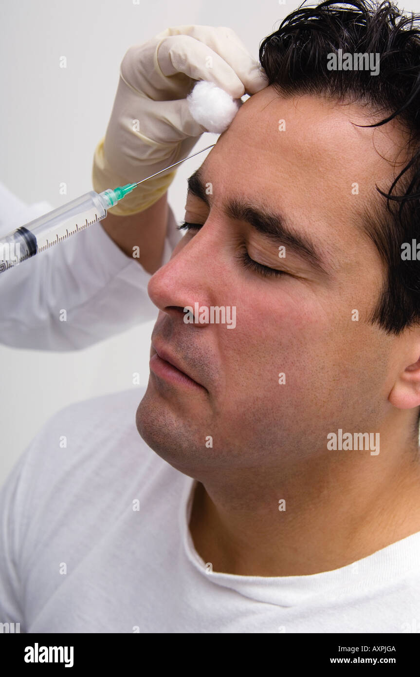 Man getting botox Stock Photo - Alamy