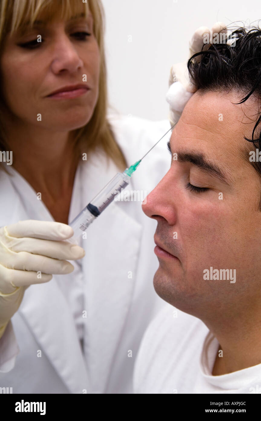 Man getting botox Stock Photo - Alamy