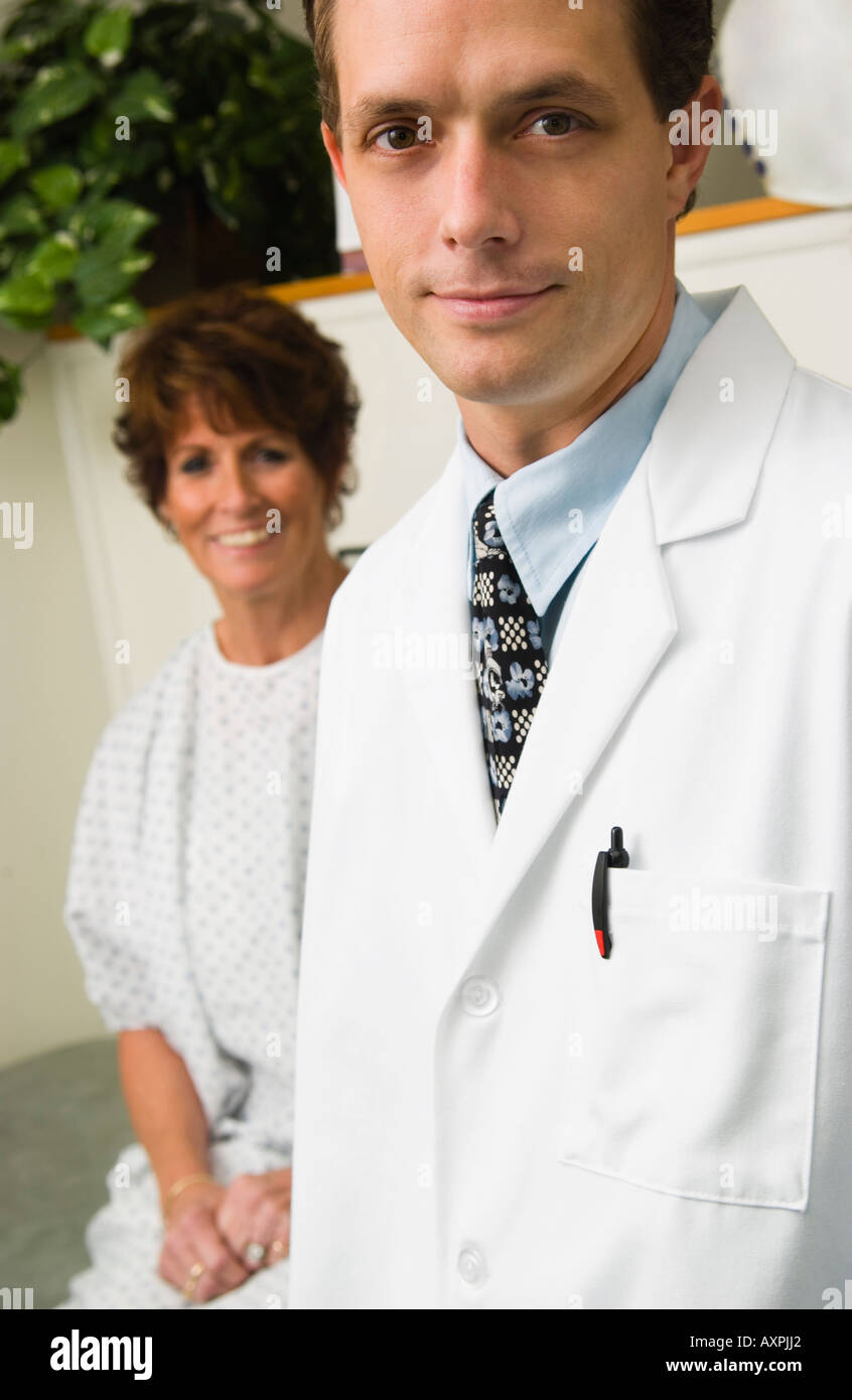 Doctor with patient Stock Photo - Alamy