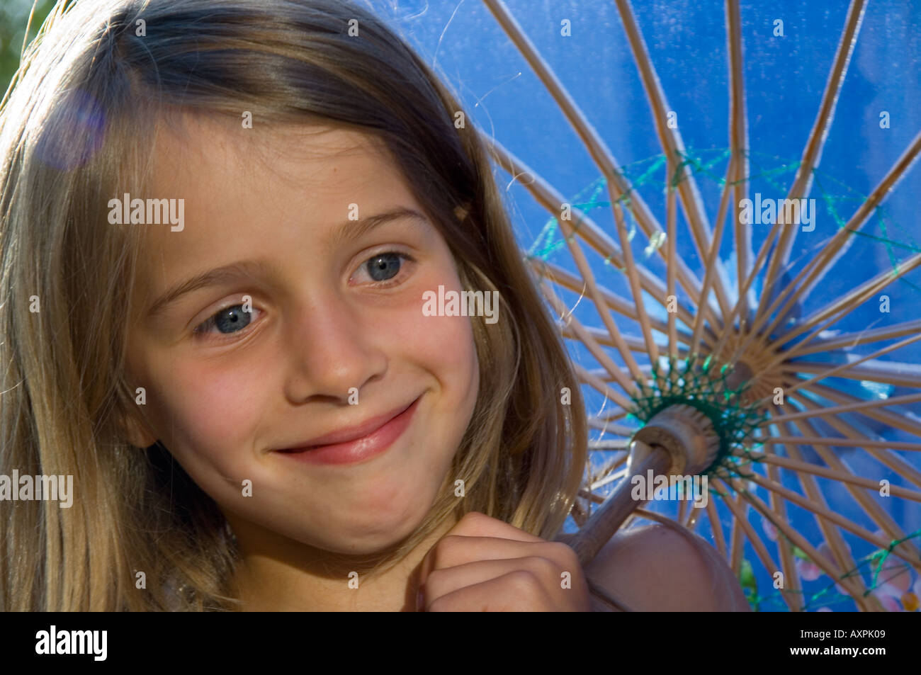 child holding a parasol Stock Photo - Alamy