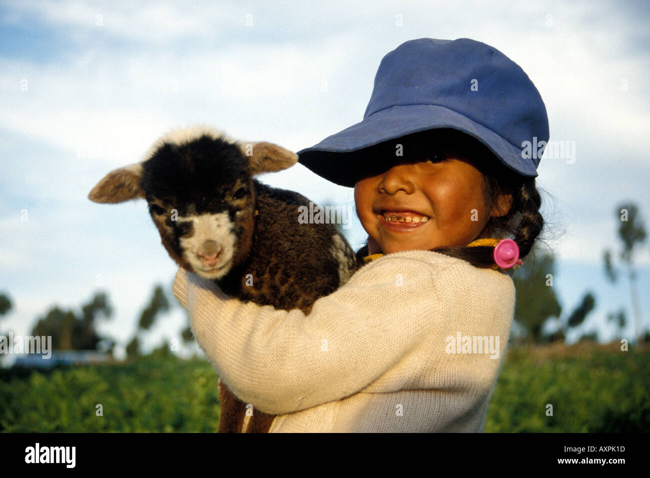 Lake Titicaca indian girl on Amantani Stock Photo - Alamy