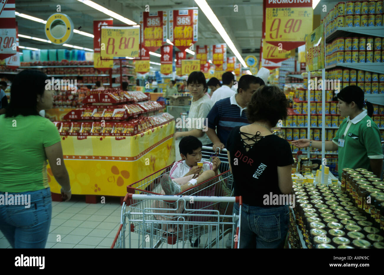 Chinese shopping in a Carrefour supermarket in Beijing, China. 24 Jul ...