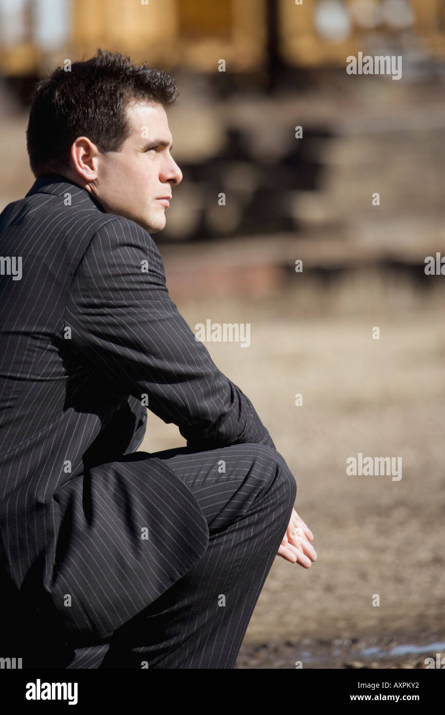 Profile of man wearing a suit Stock Photo - Alamy