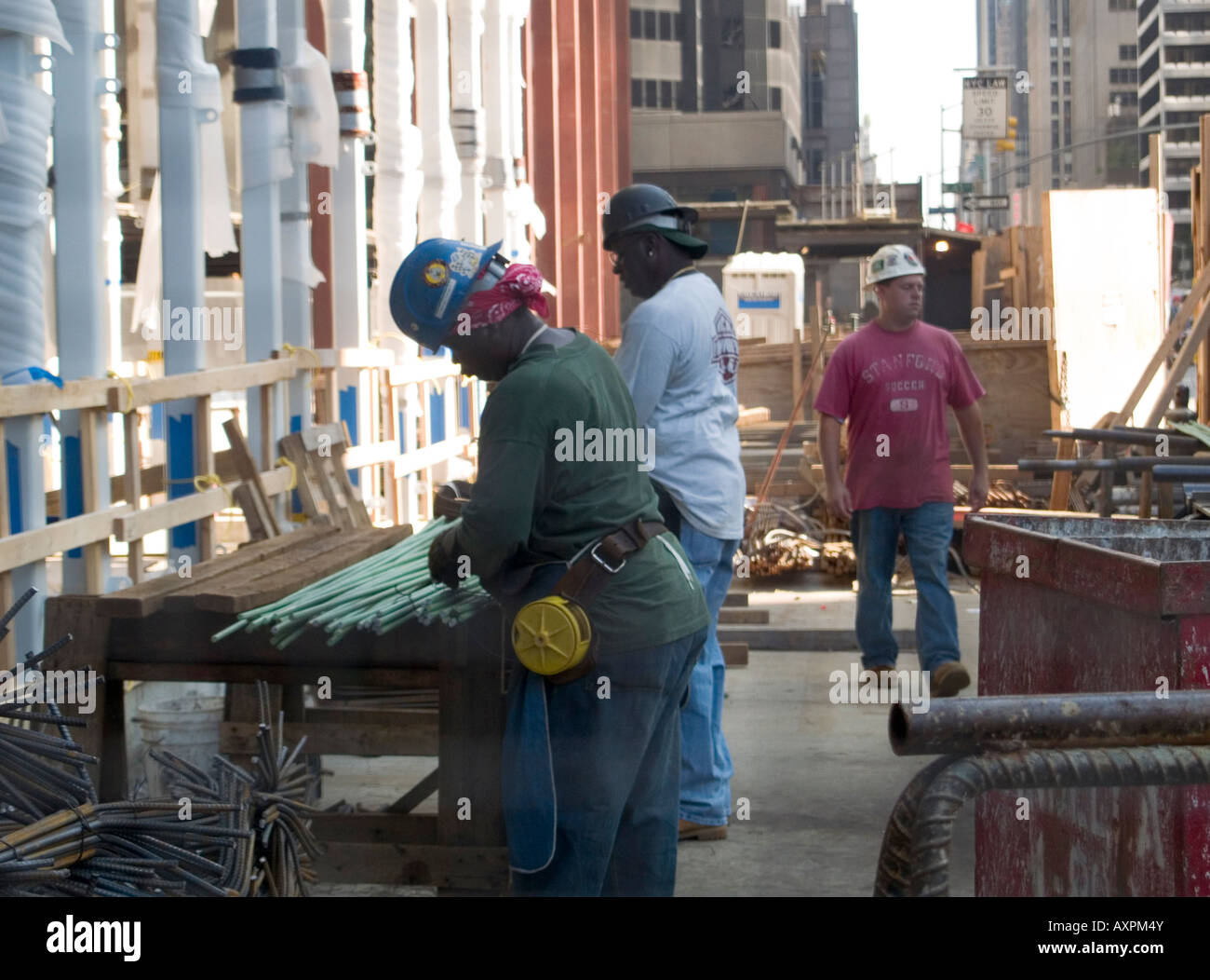 Construction workers on a site in New York City USA Stock Photo - Alamy
