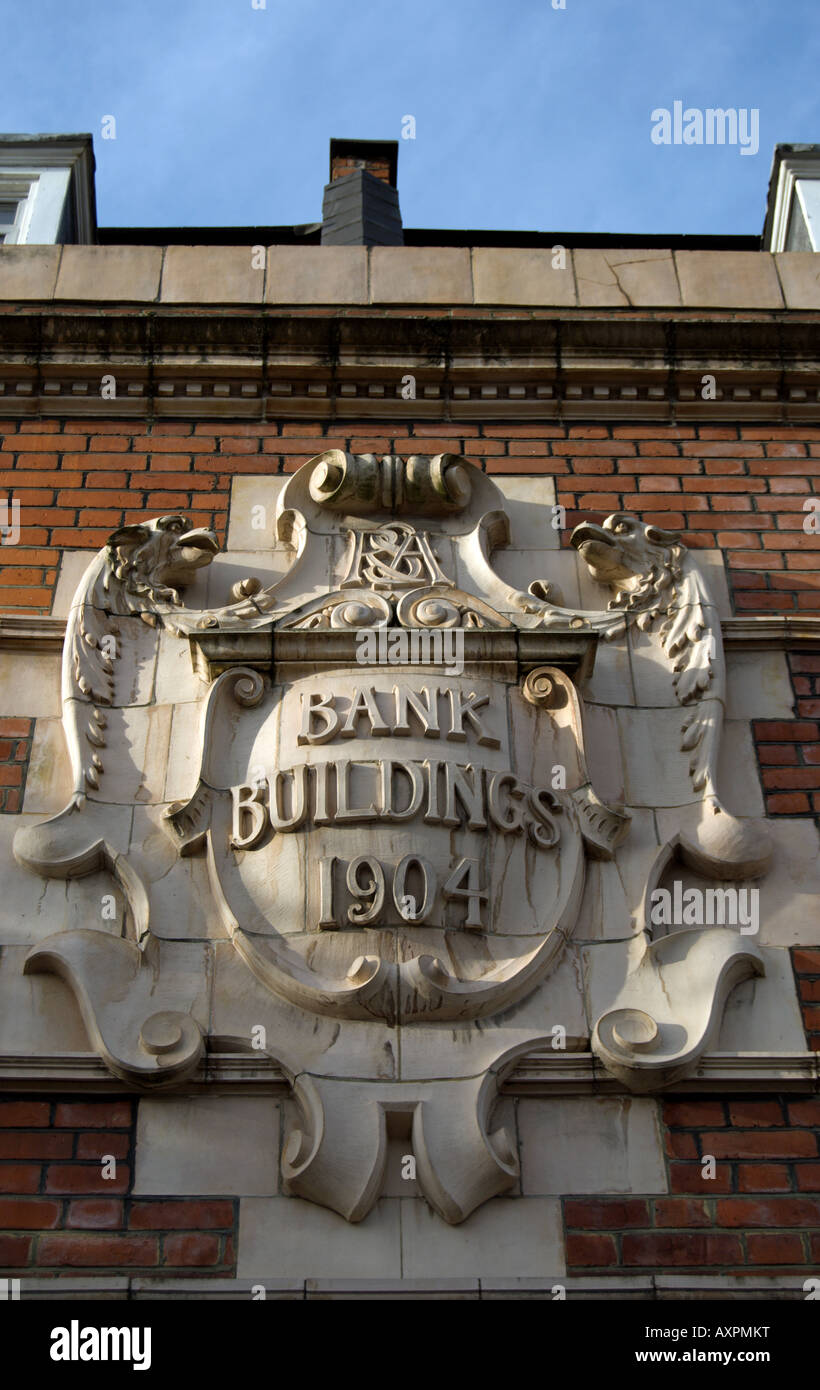crest on row of buildings with lettering stating bank buildings 1904 ...