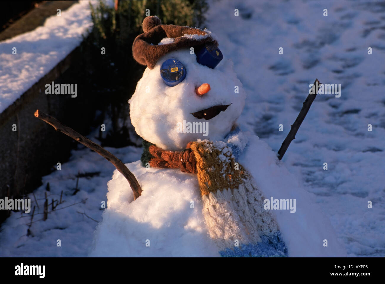 Snowman with stick arms hi-res stock photography and images - Alamy