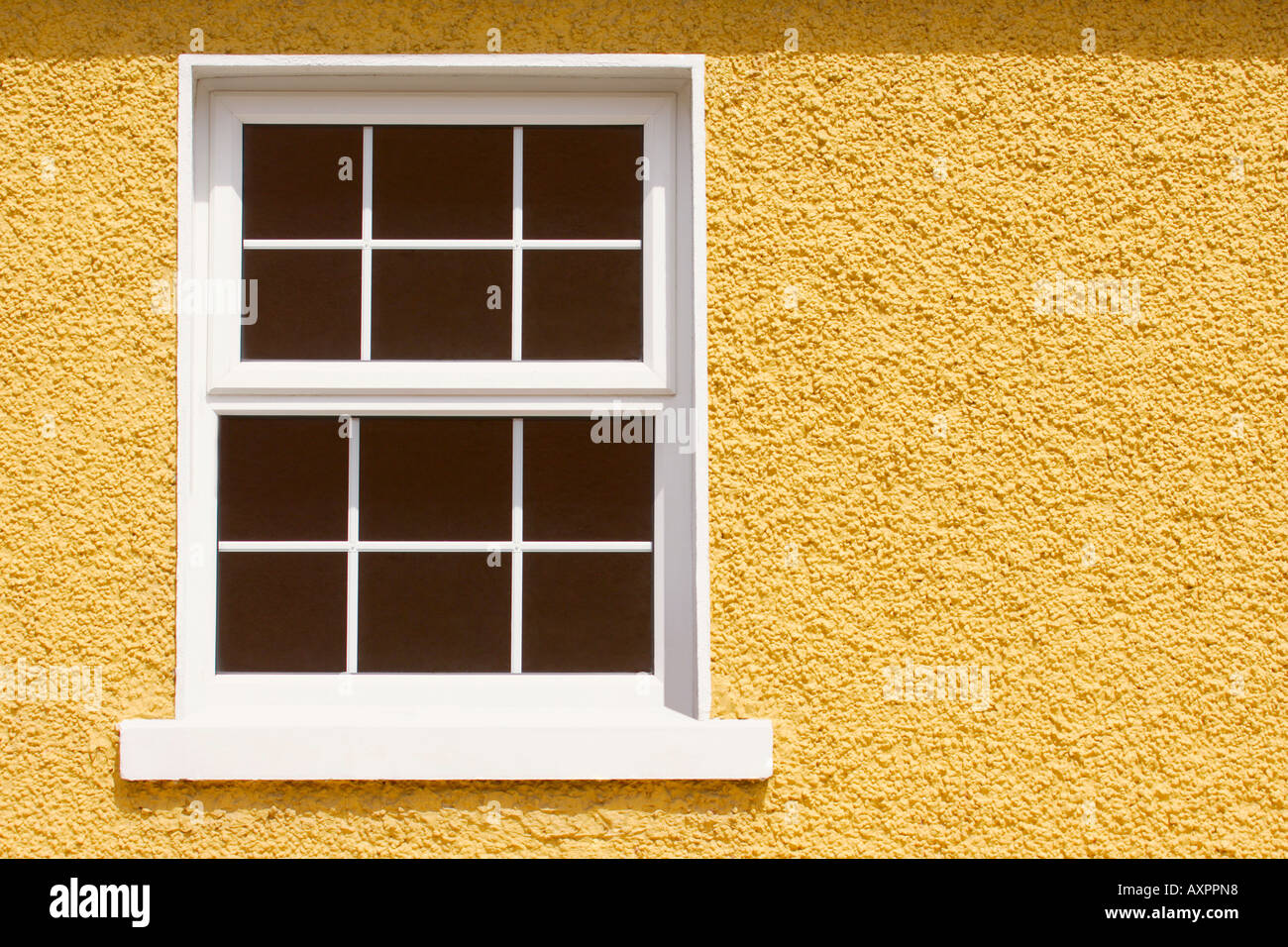 Window with stucco exterior Stock Photo - Alamy
