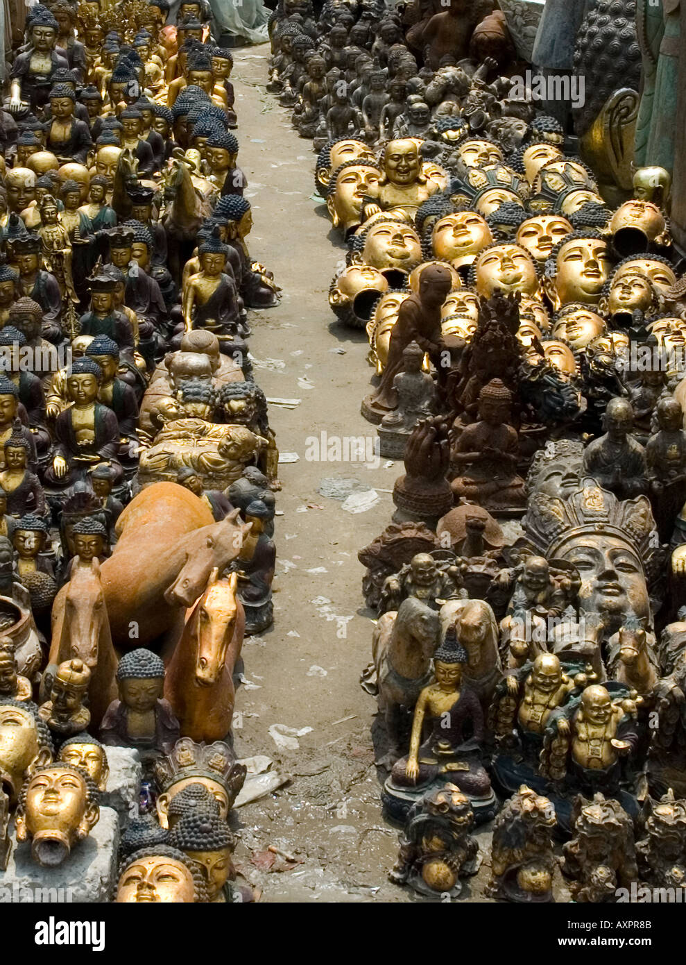 Buddha's heads on display at street market Beijing,China Stock Photo ...