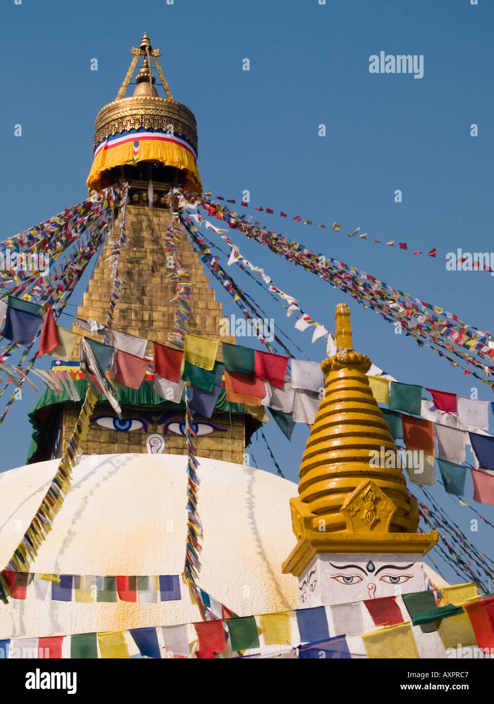 GOLDEN PYRAMID of BOUDHANATH STUPA with prayer flags in Kathmandu ...