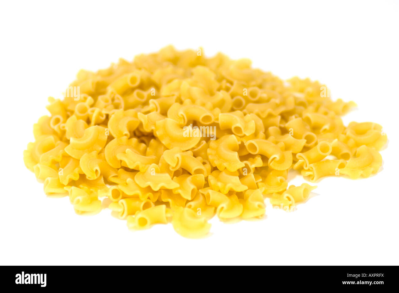 Yellow natural macaroni products isolated Stock Photo - Alamy