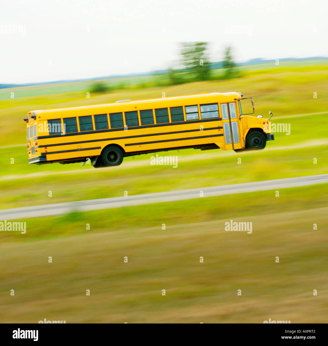Moving school bus Stock Photo - Alamy