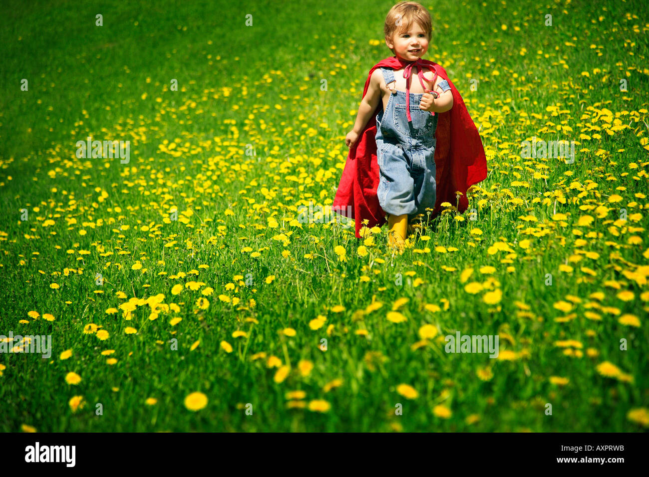 Boy playing in cape Stock Photo - Alamy
