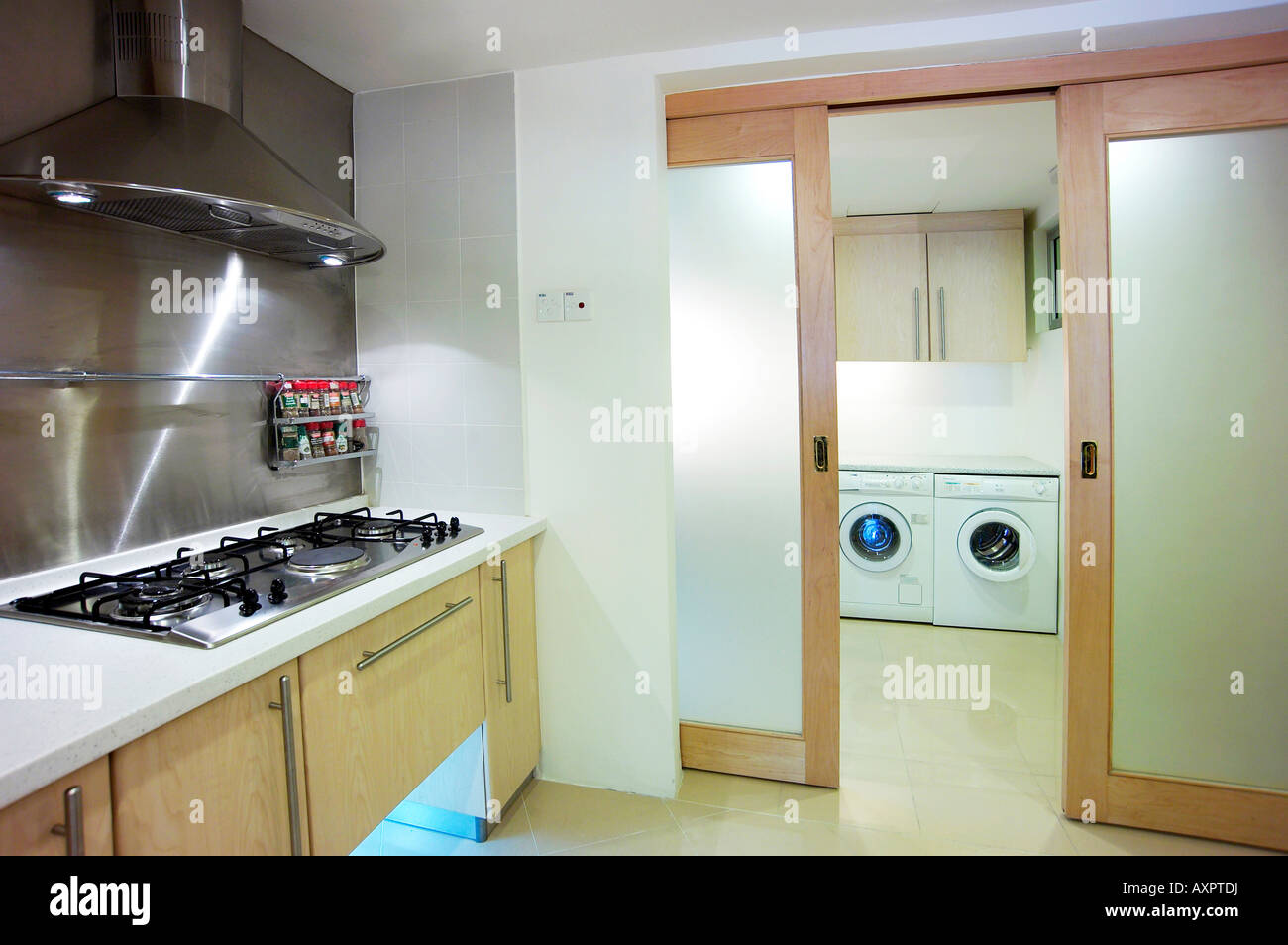 kitchen stove and hood Stock Photo - Alamy