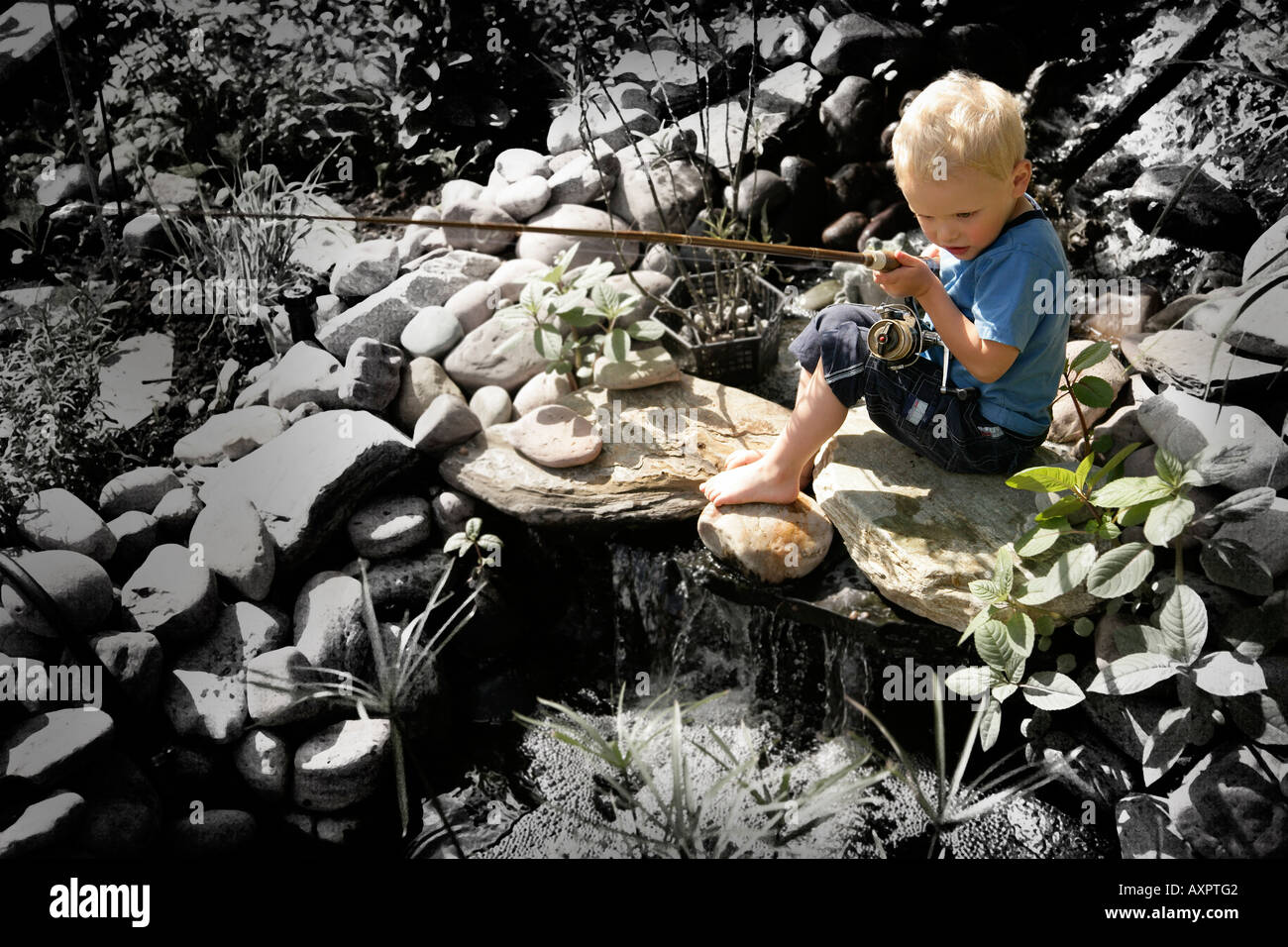 Boy fishing sports hi-res stock photography and images - Alamy