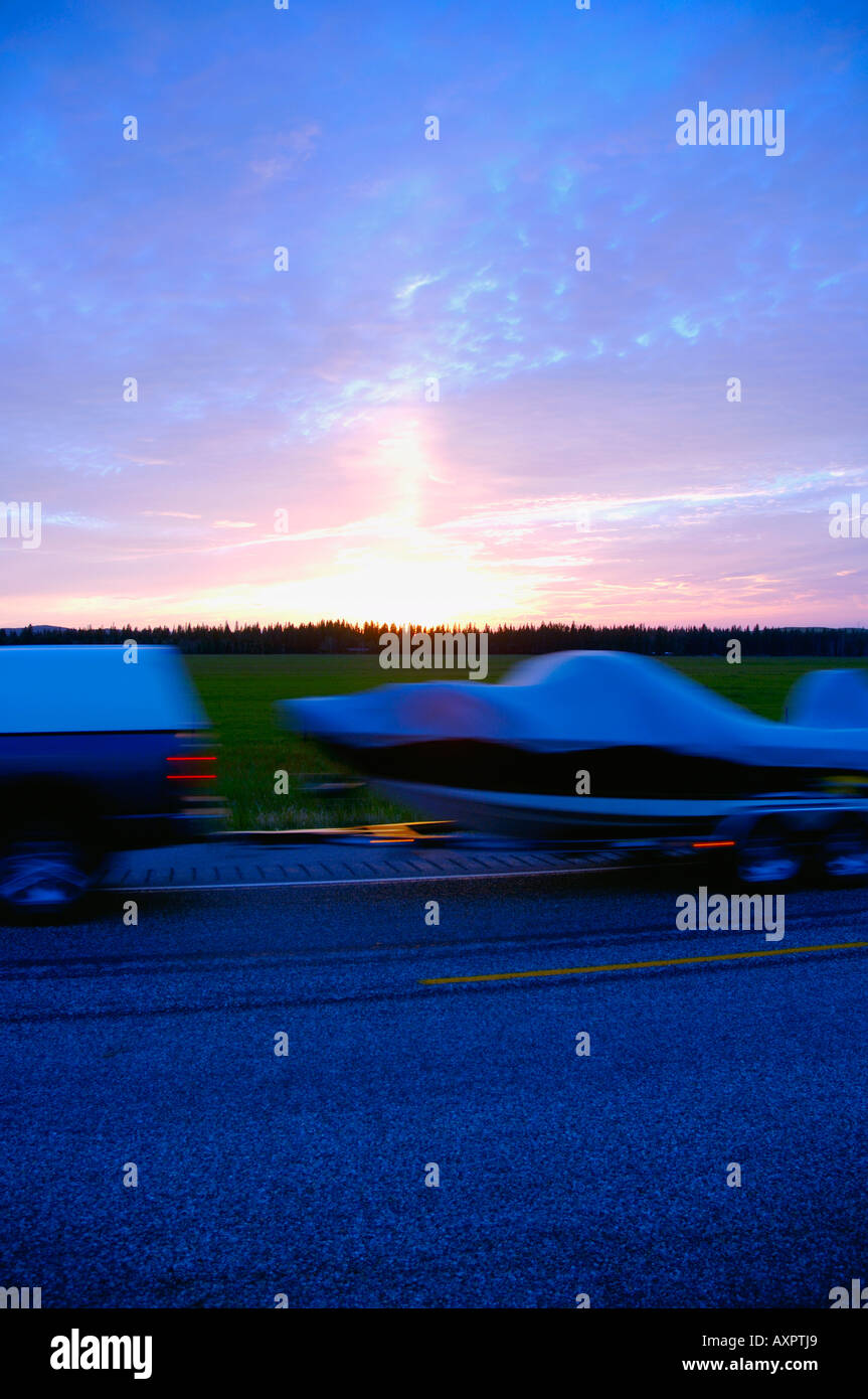 Boat being towed on highway Stock Photo - Alamy