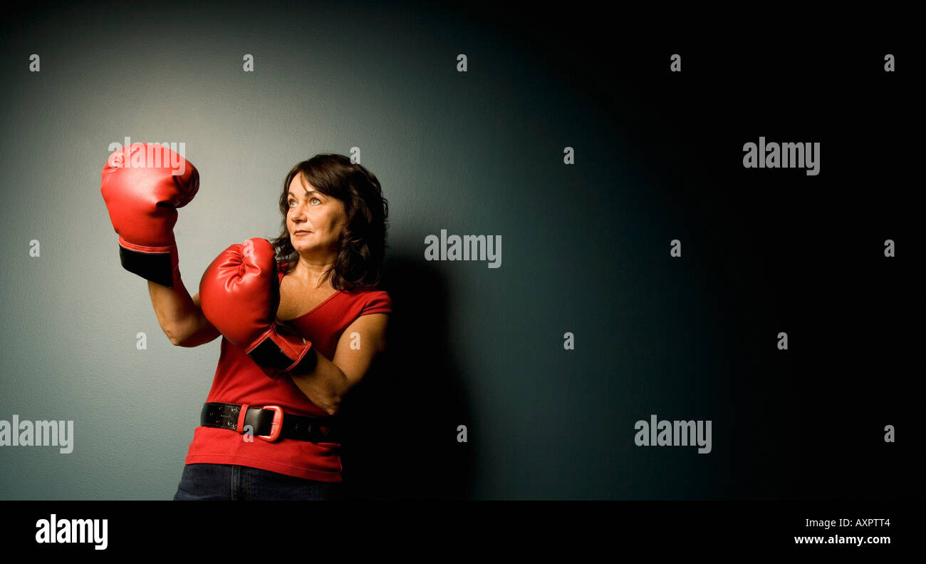 Woman with boxing gloves Stock Photo - Alamy