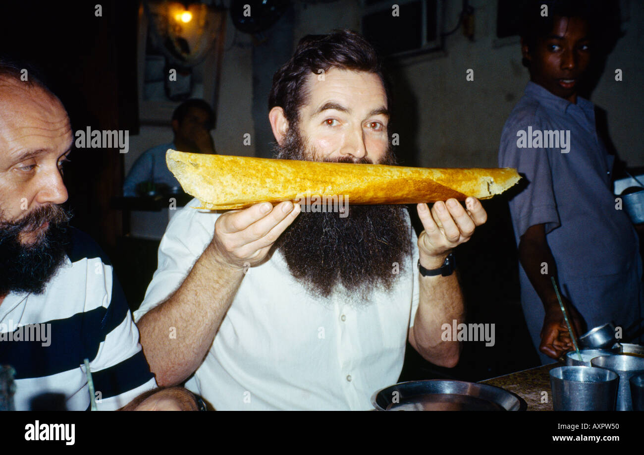 Man eating dosa hi-res stock photography and images - Alamy