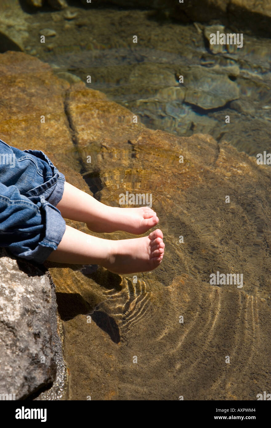 Little feet testing out water Stock Photo - Alamy