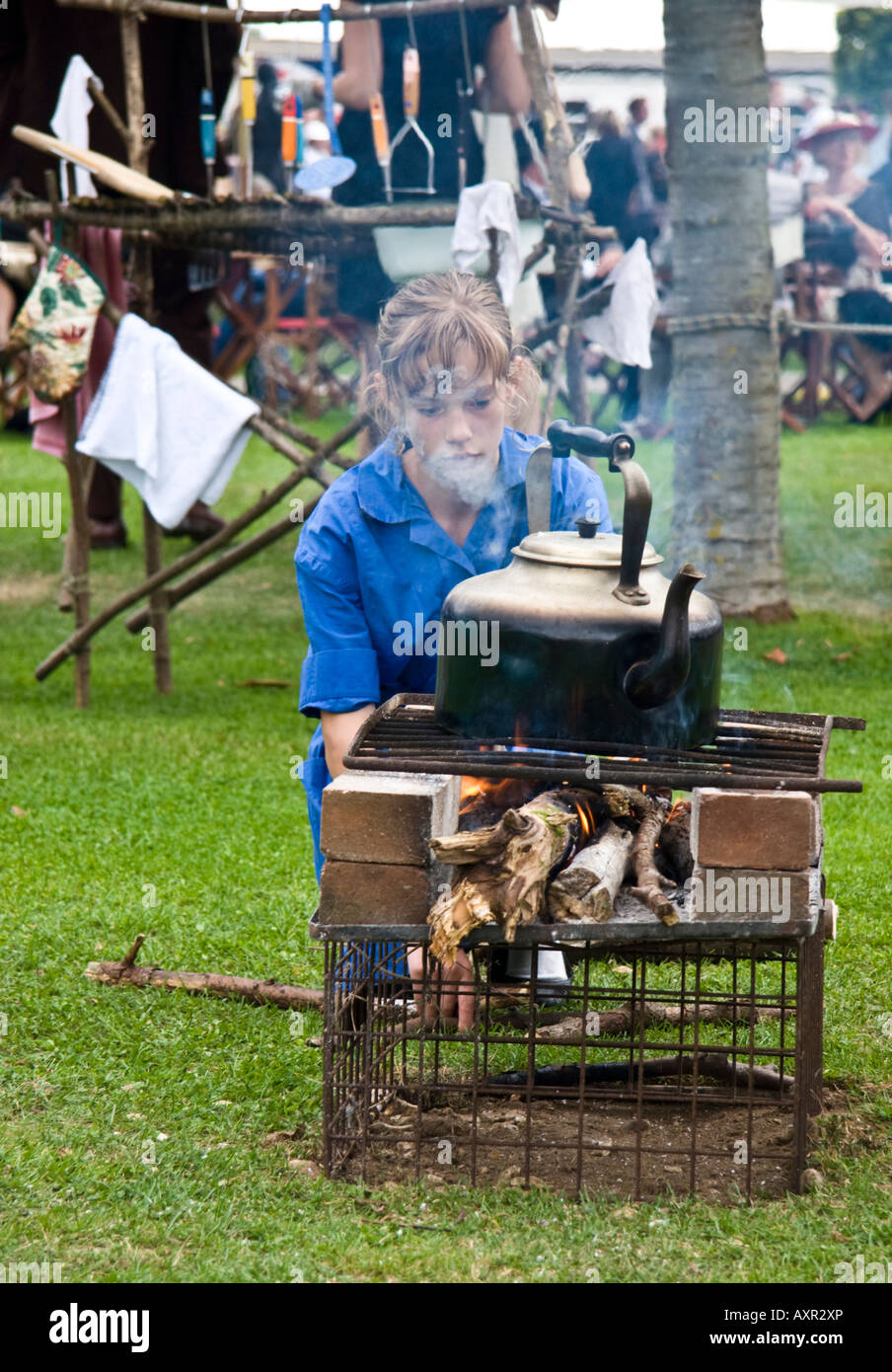 Girl Guide boiling the kettle at Goodwood Revival 2007 Stock Photo - Alamy