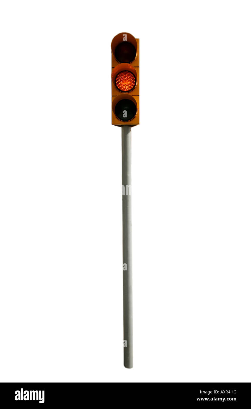 Orange caution traffic light Stock Photo - Alamy
