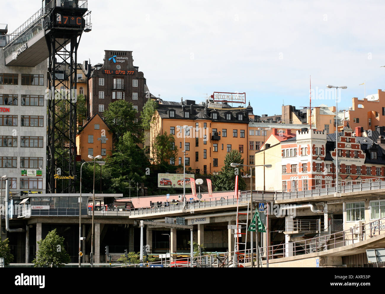 Crowded city street with various styles of buildings, old and new Stock ...
