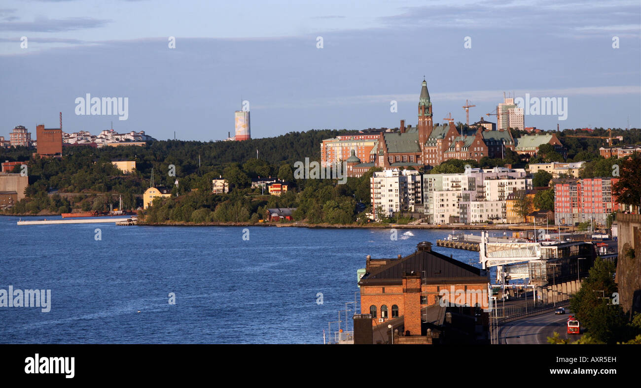 Waterfront scene of historic buildings at sunset Stock Photo - Alamy