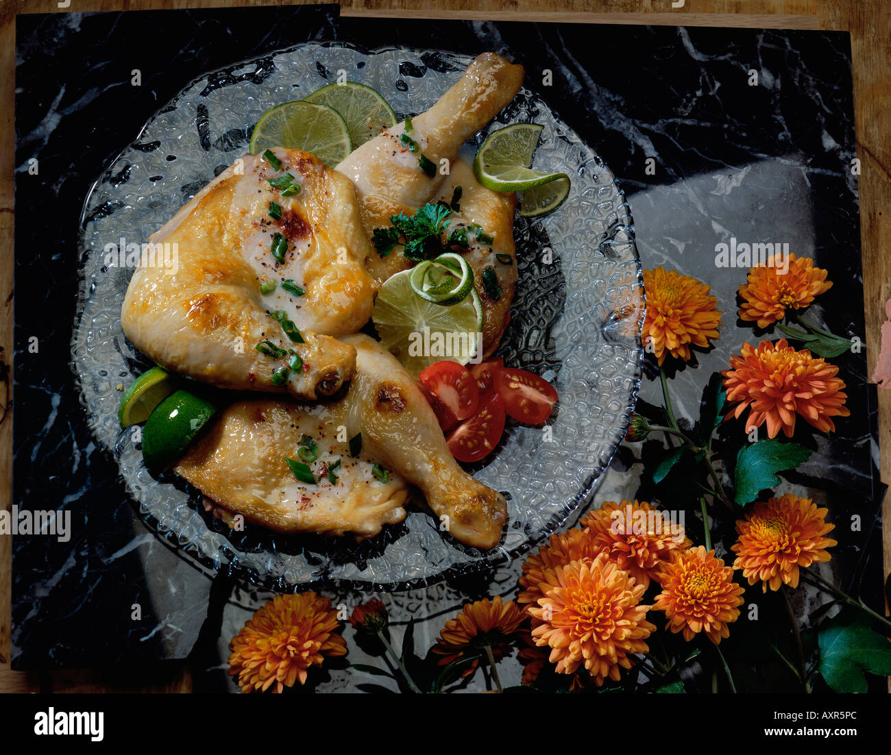 Baked chicken on a plate Stock Photo - Alamy