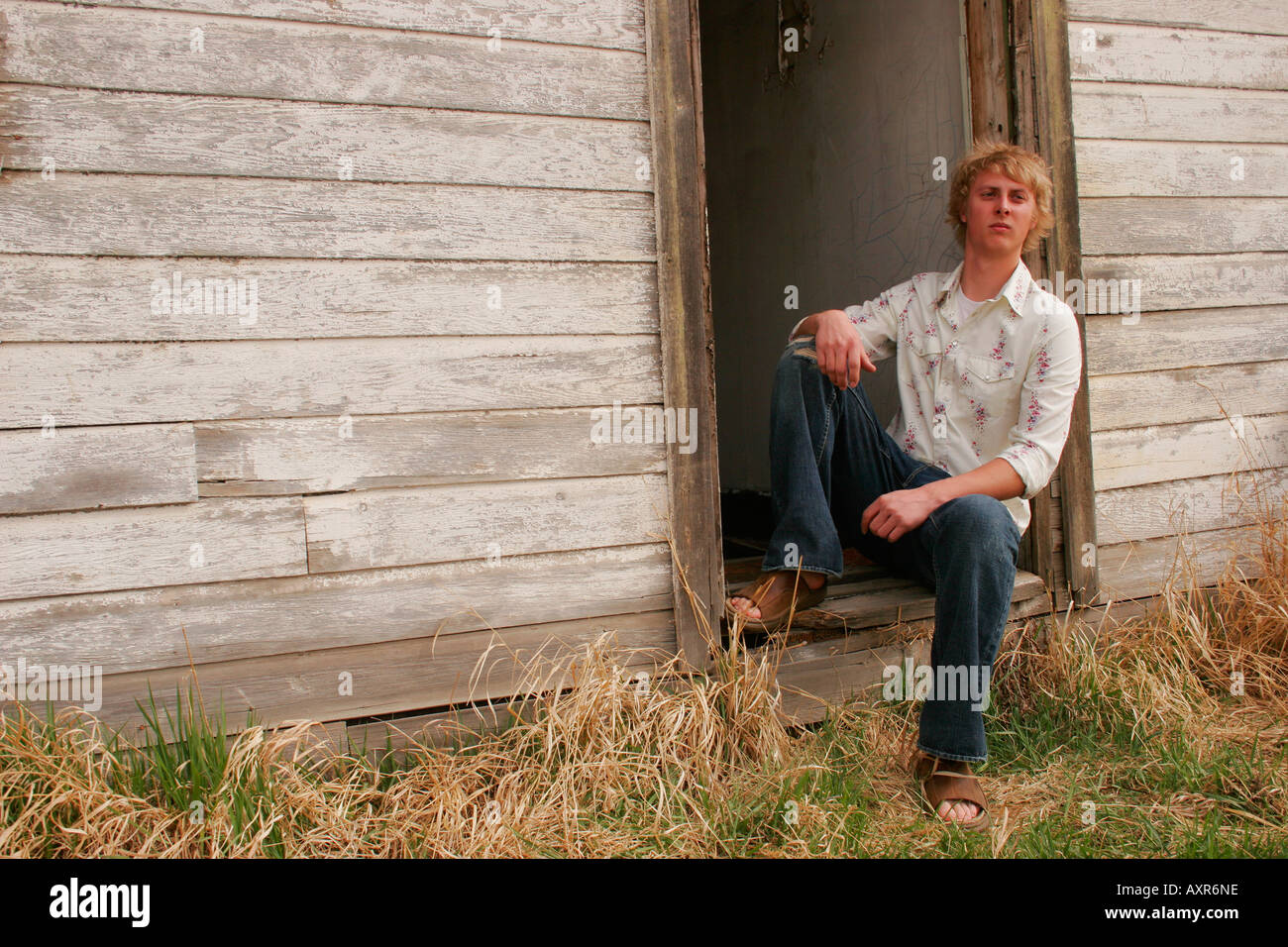 Man in western setting Stock Photo - Alamy