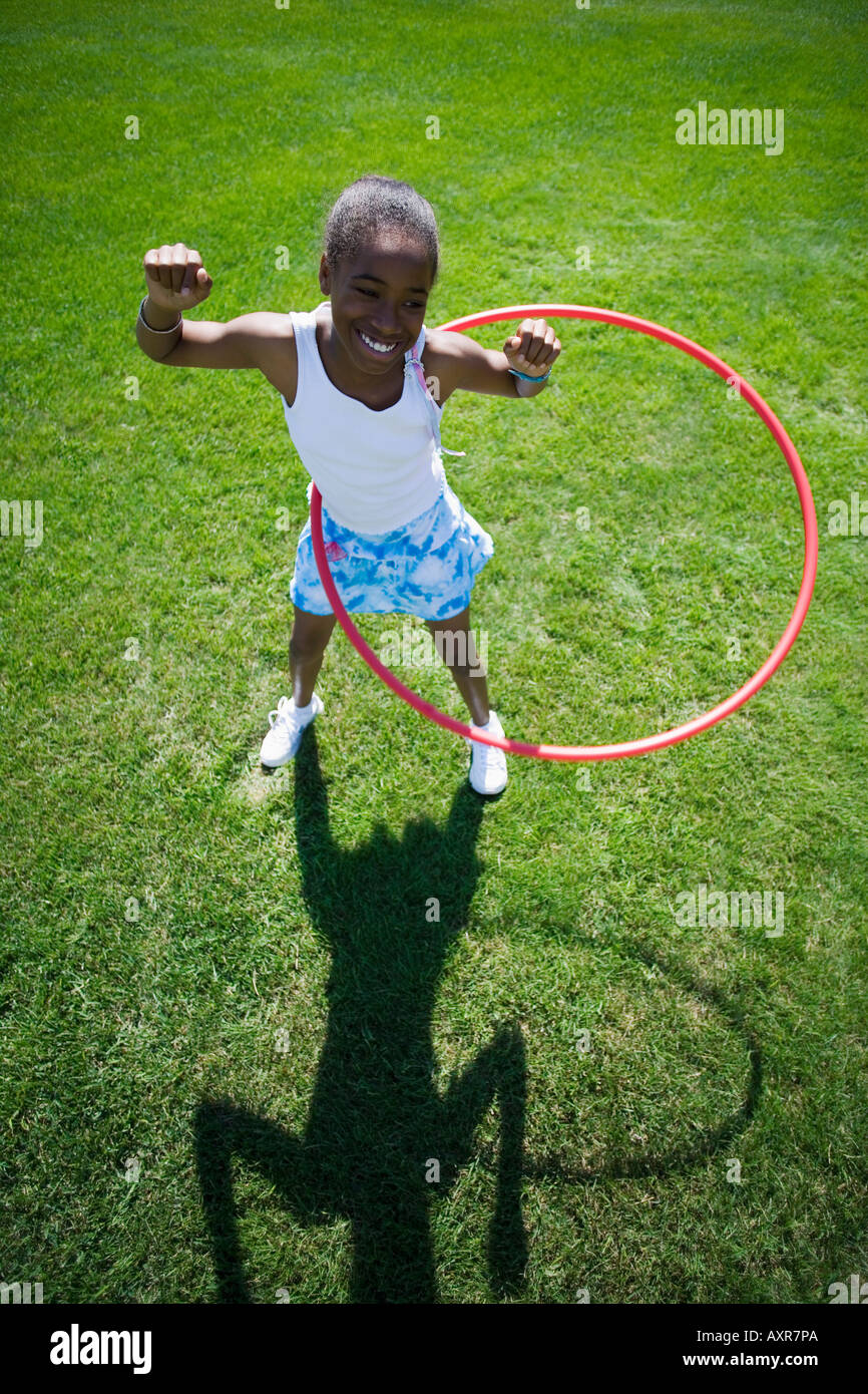 Happy kid hula hoop african american hi-res stock photography and ...
