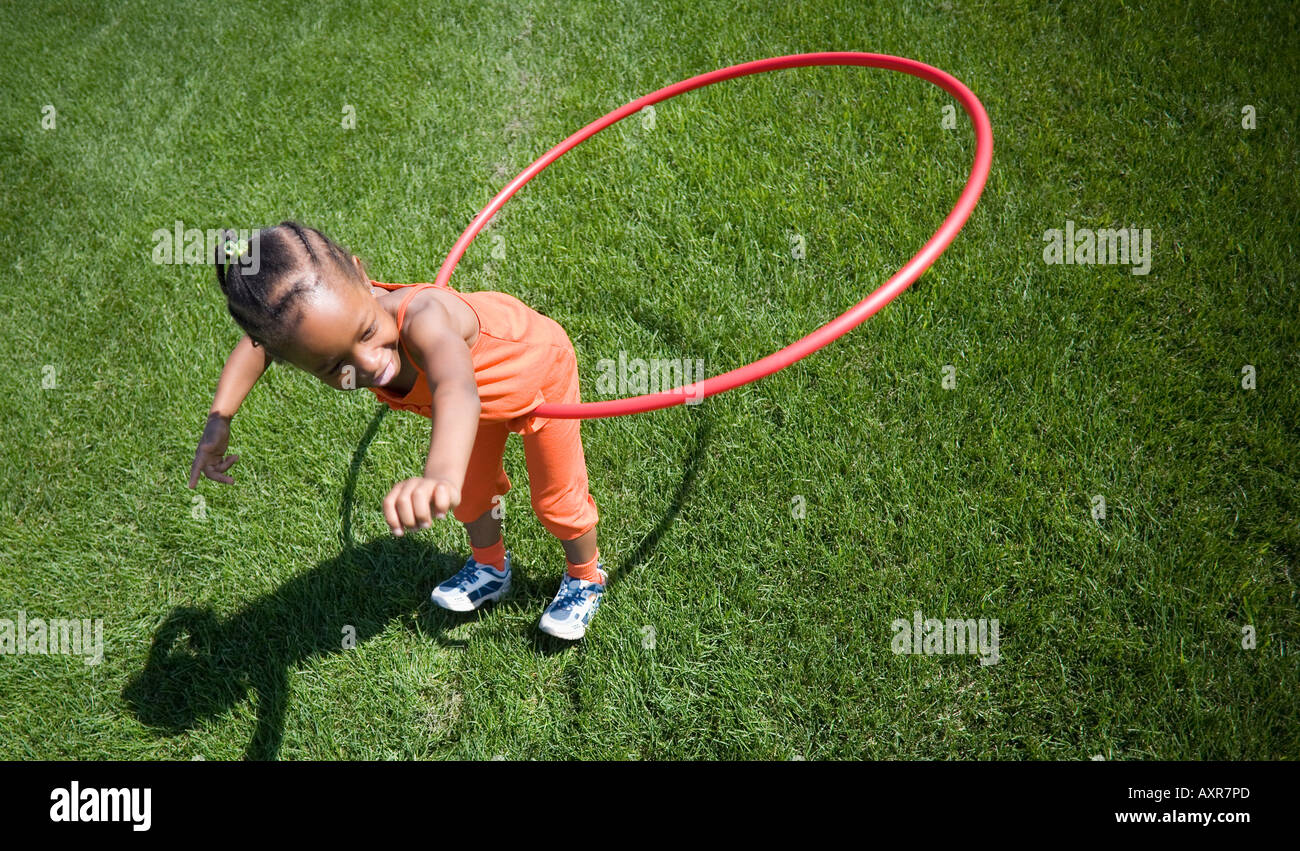 Happy kid hula hoop african american hi-res stock photography and ...
