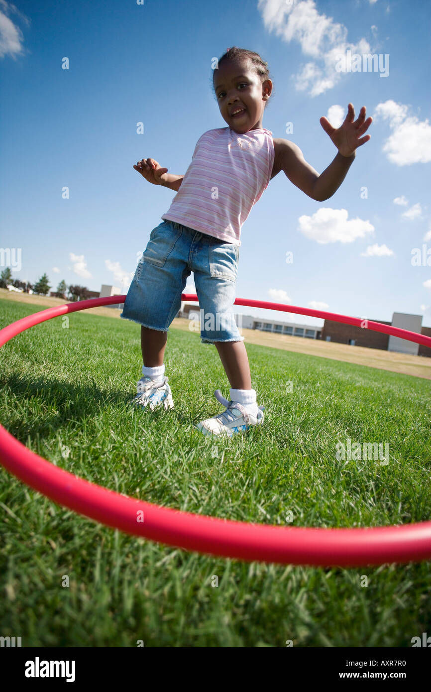 Female kids children hoola hoop hi-res stock photography and images - Alamy