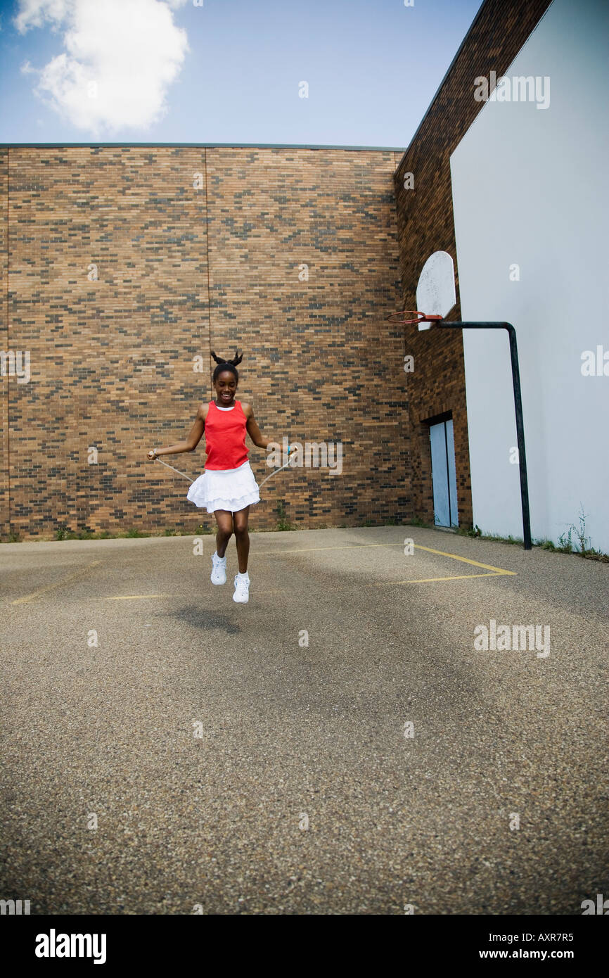 Child jumping rope Stock Photo - Alamy