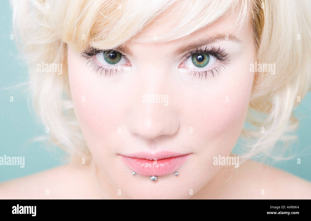 Woman with lip piercings Stock Photo - Alamy